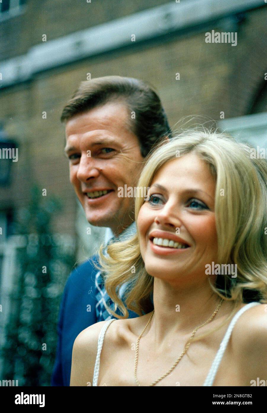 Swedish actress Britt Eklund and British actor Roger Moore are seen in ...