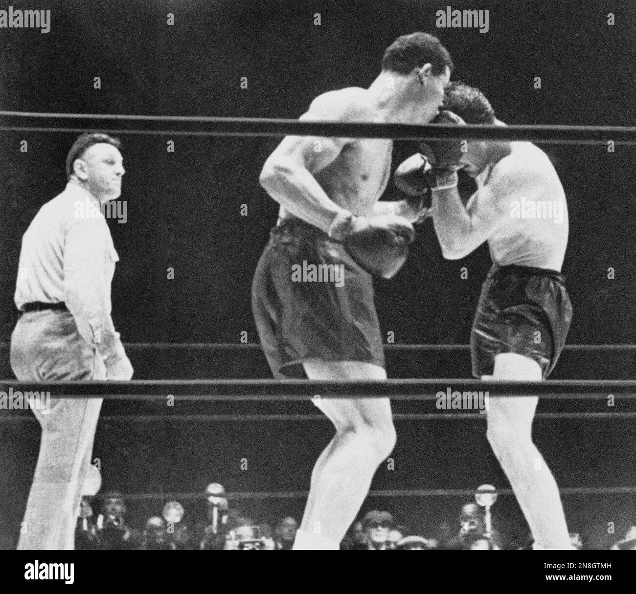 World heavyweight champion Joe Louis beginning in the 13th round with ...