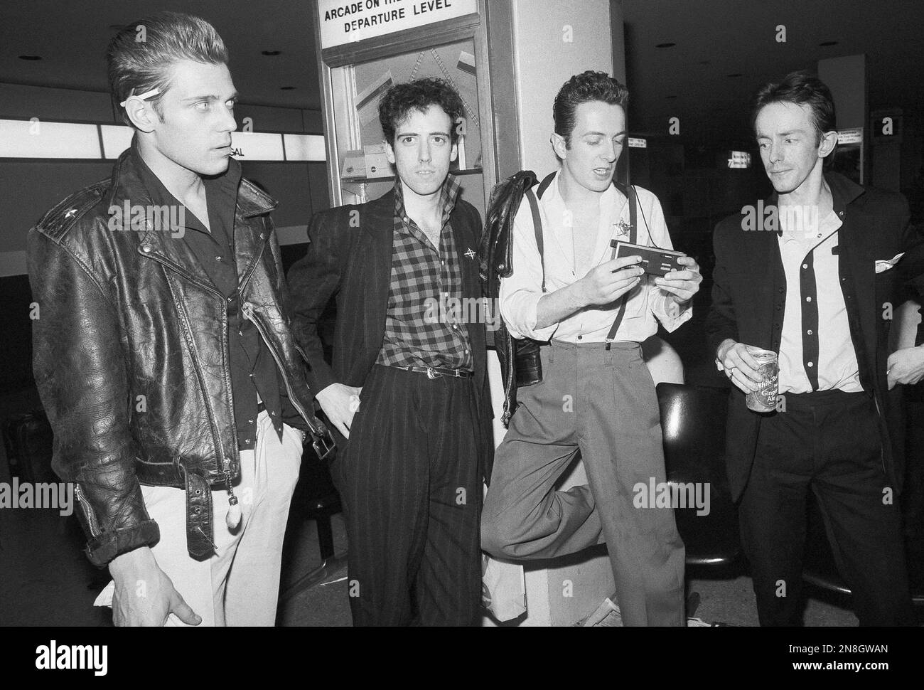 Members of the British rock group The Clash arriving at JFK airport ...