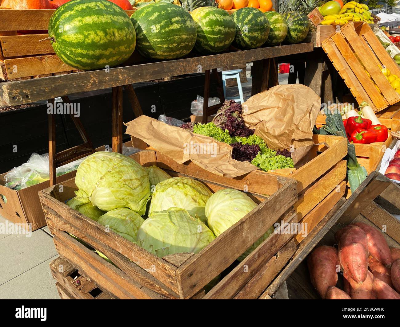 A variety of fruits and vegetables on display at a market Stock Photo ...