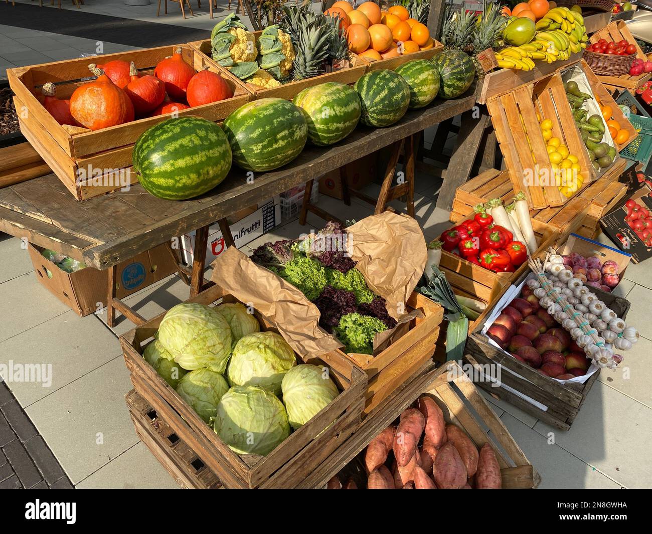 A variety of fruits and vegetables on display at a market Stock Photo ...