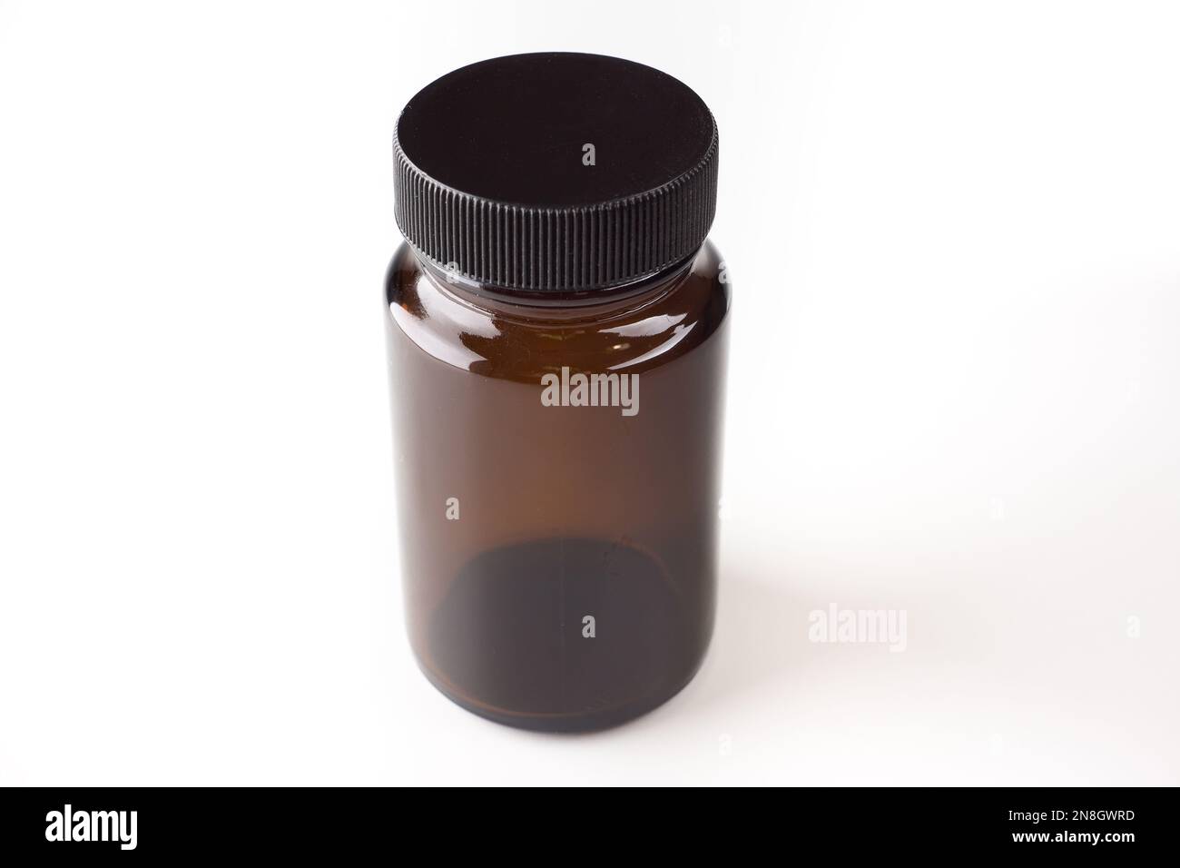 medical jars with dark glass caps for tablets Stock Photo - Alamy