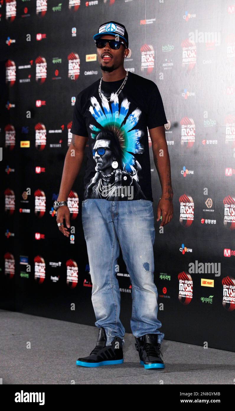 American singer B.o.B poses for the photographers during the news ...