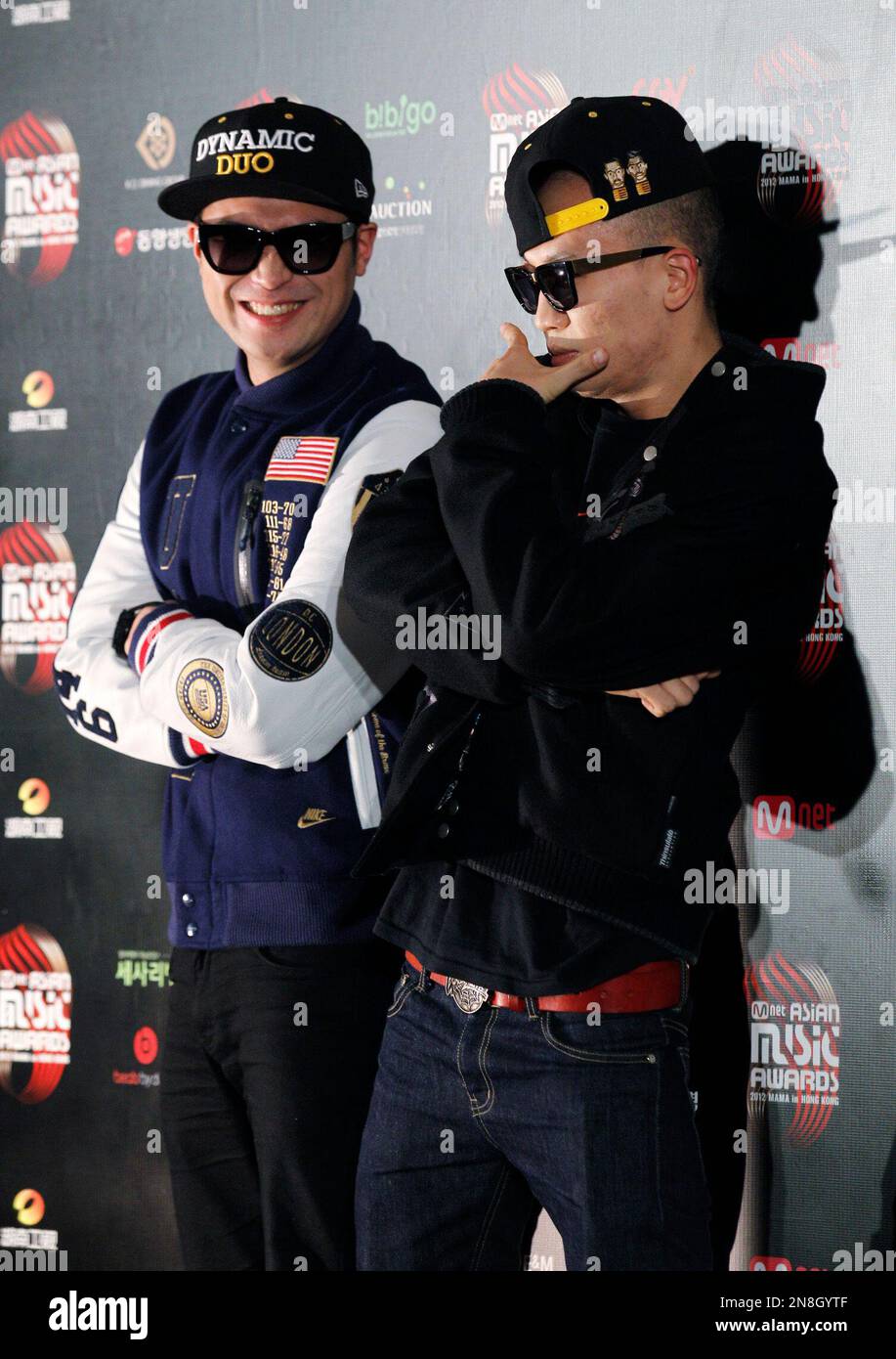 South Korea's Dynamic Duo pose for the photographers during the news ...