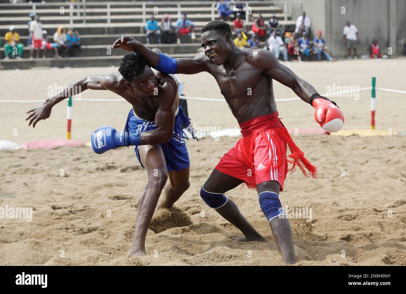 Razak Lawal, left, of Akwa Ibom state fights with Bahago Musa of Edo ...