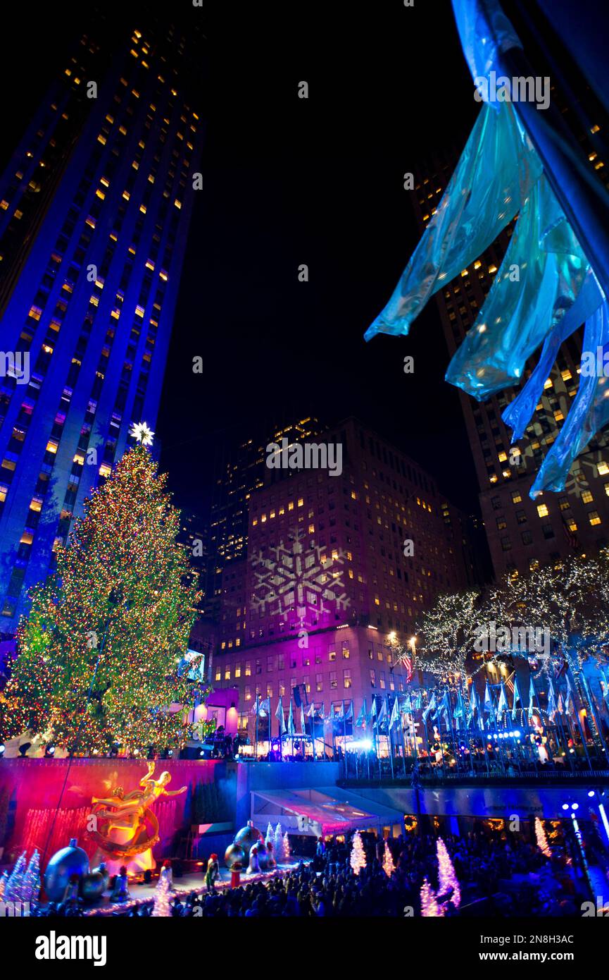 The 80-foot-tall Rockefeller Center Christmas tree is lit using 45,000 ...