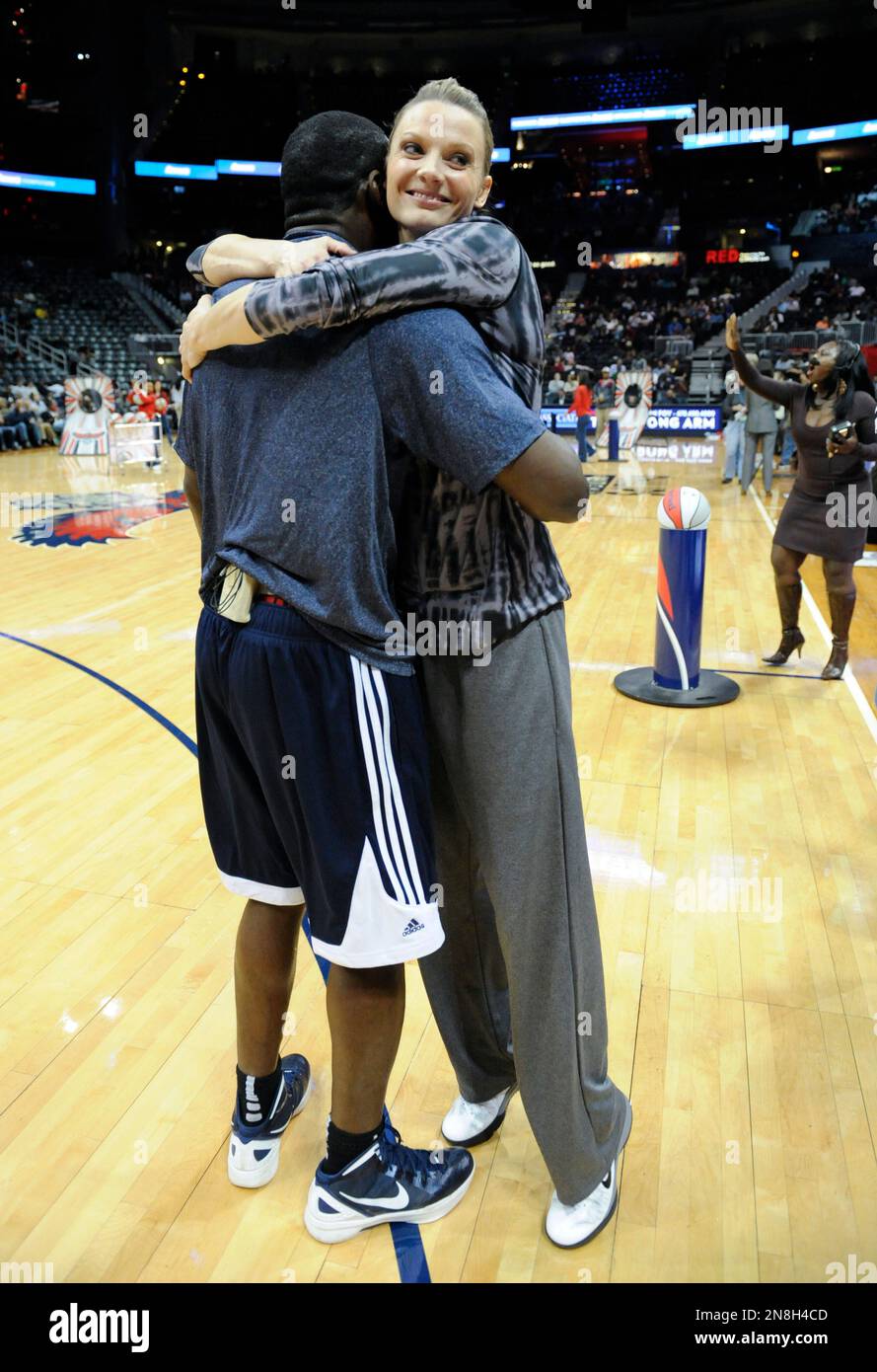 NFL Network personalities Michael Irvin hugs Stacey Dales as after ...
