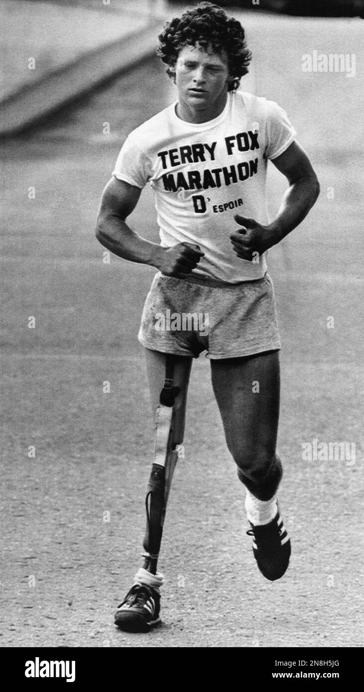 Terry Fox, who lost his right leg to cancer three years ago, runs ...