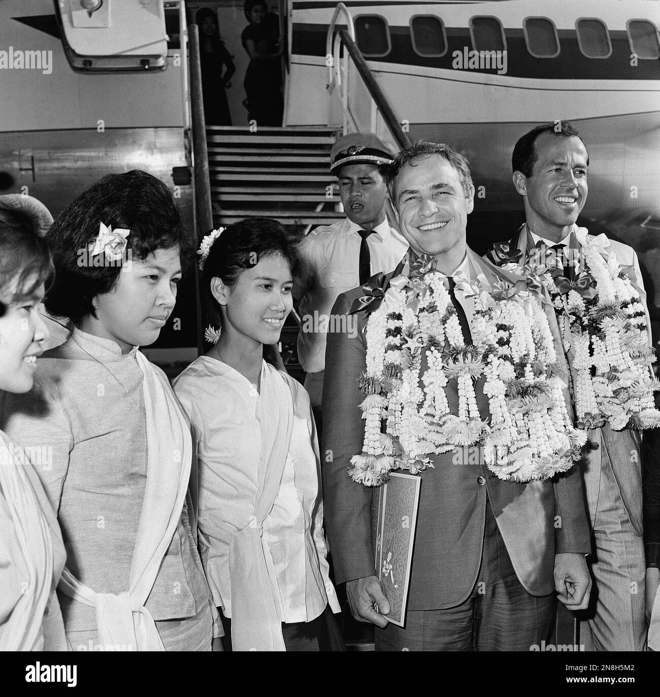 Actor Marlon Brando and Producer George England are decorated with ...