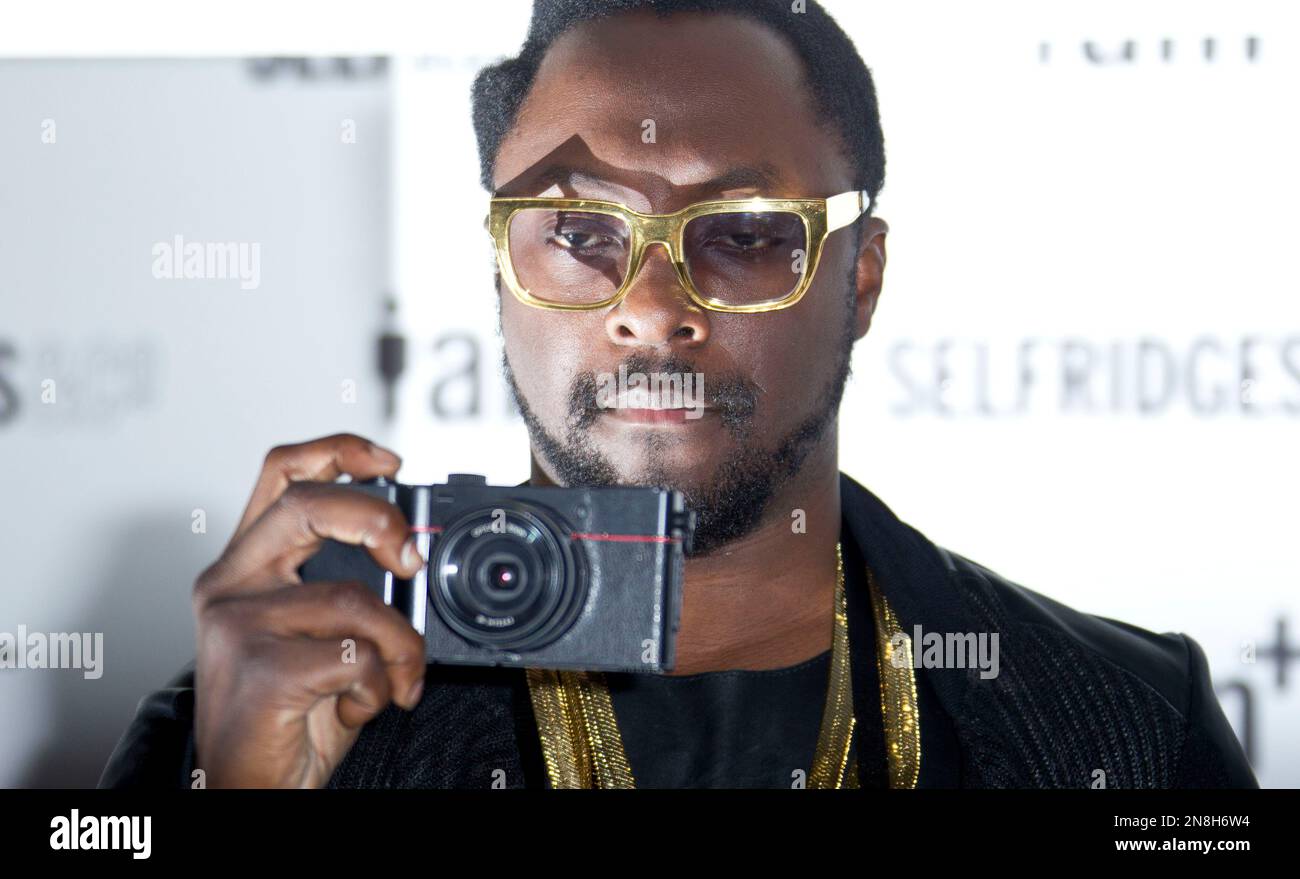 Musician and entrepreneur will.i.am poses with his new i.am+foto camera ...