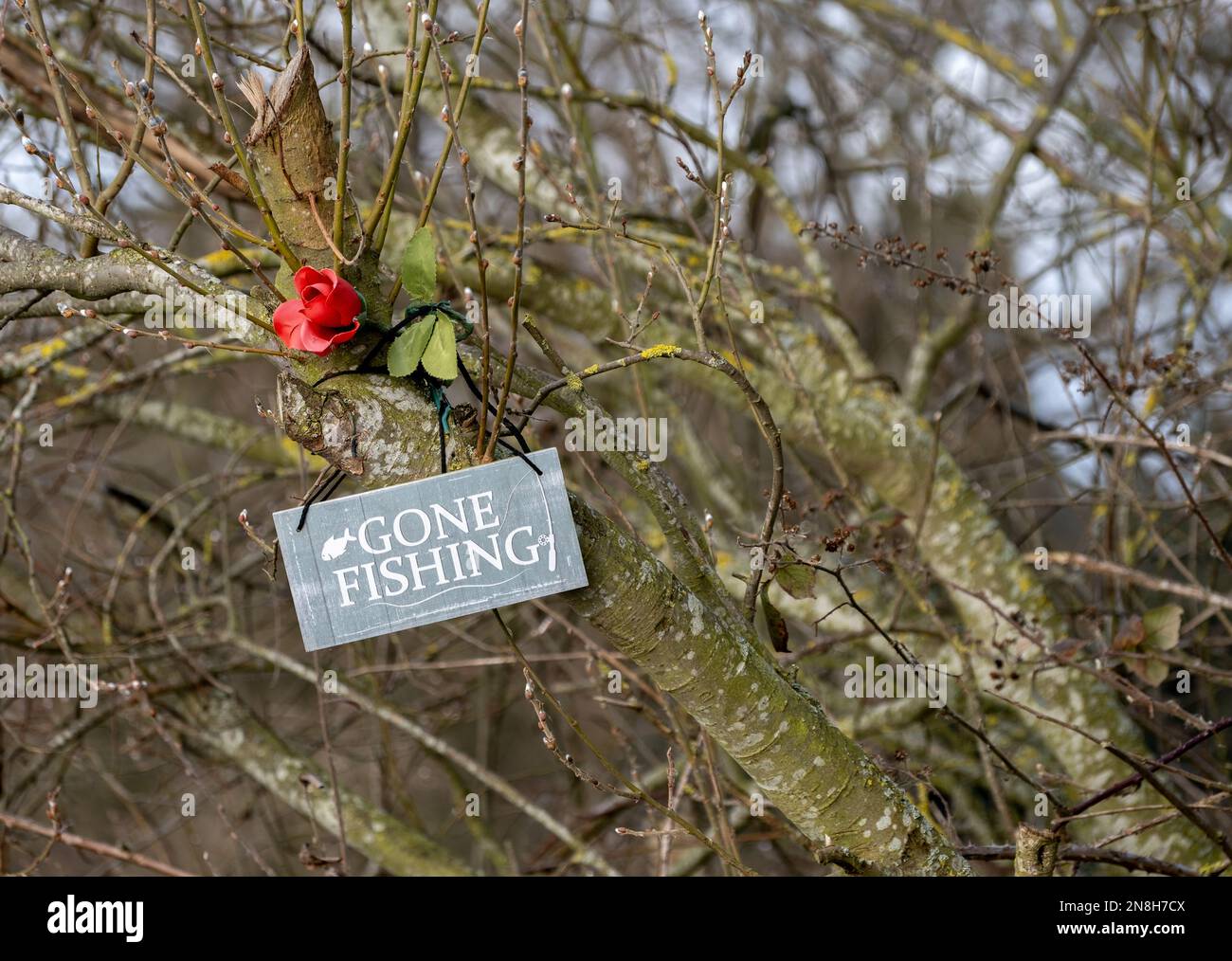 Gone fishing memorial plaque Stock Photo - Alamy
