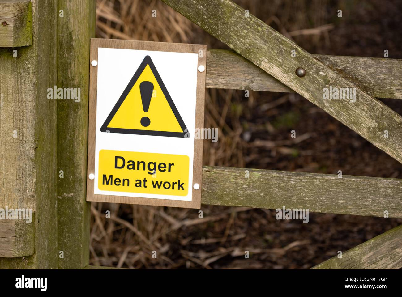 Danger Men at Work sign Stock Photo - Alamy