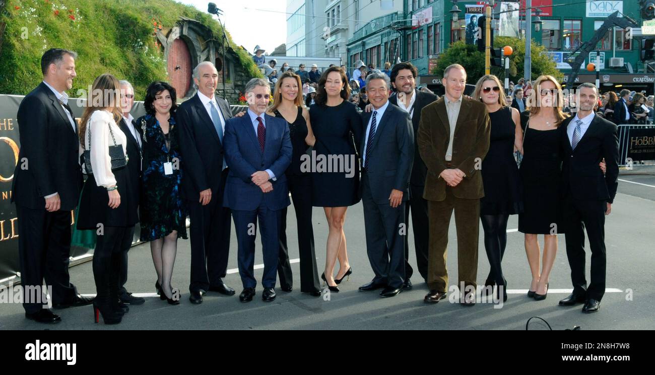 The management of New Line, MGM and Warner Brothers pose for a group ...