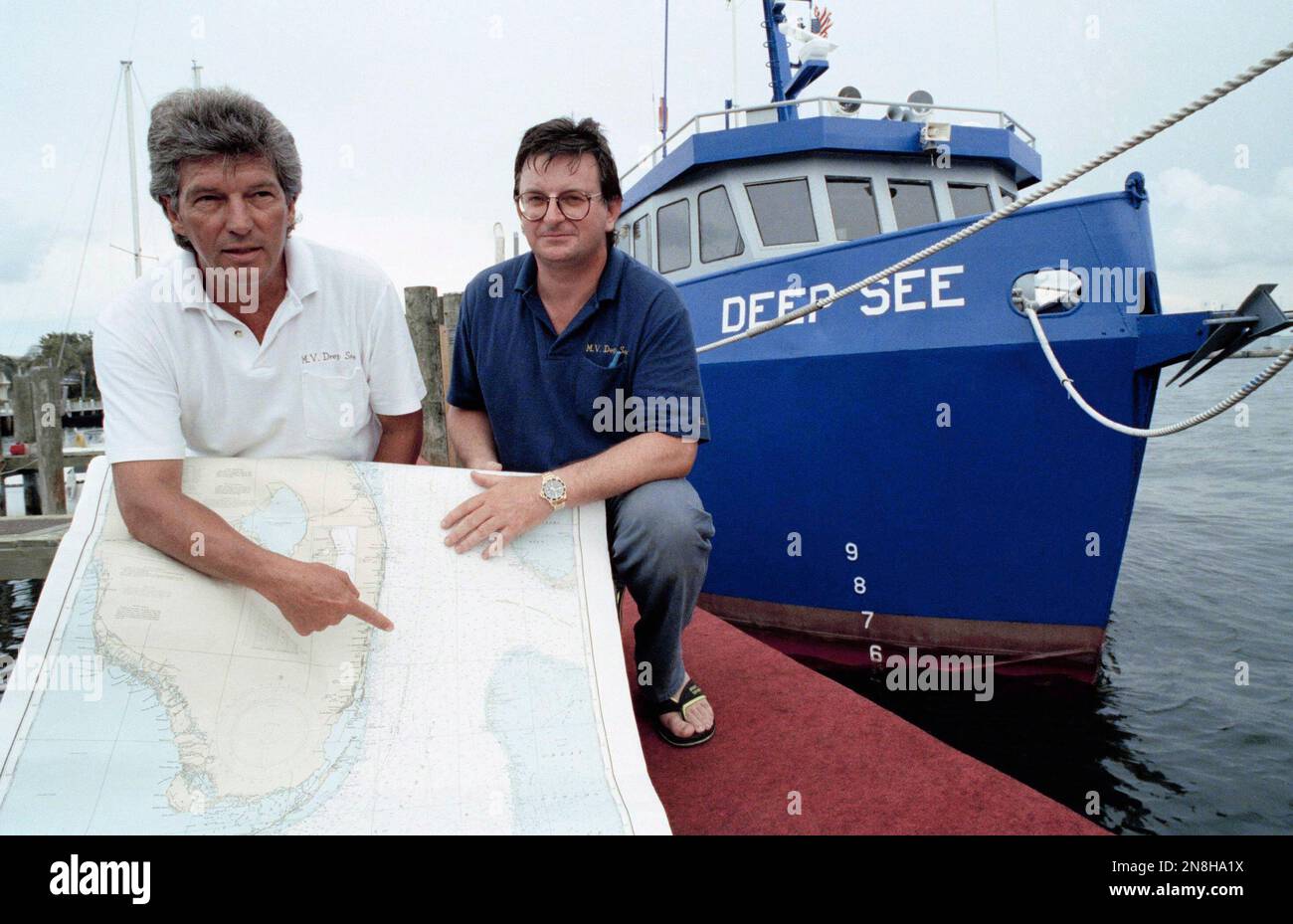 Captain Keith Calloway, left, and submersible robot designer Graham ...