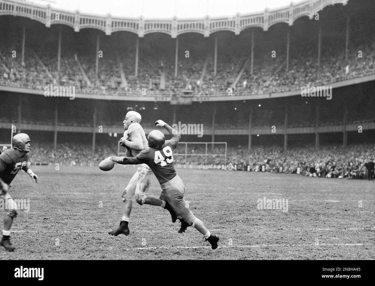 John Helwig (49), Notre Dame Guard, knocks down a North Carolina pass ...