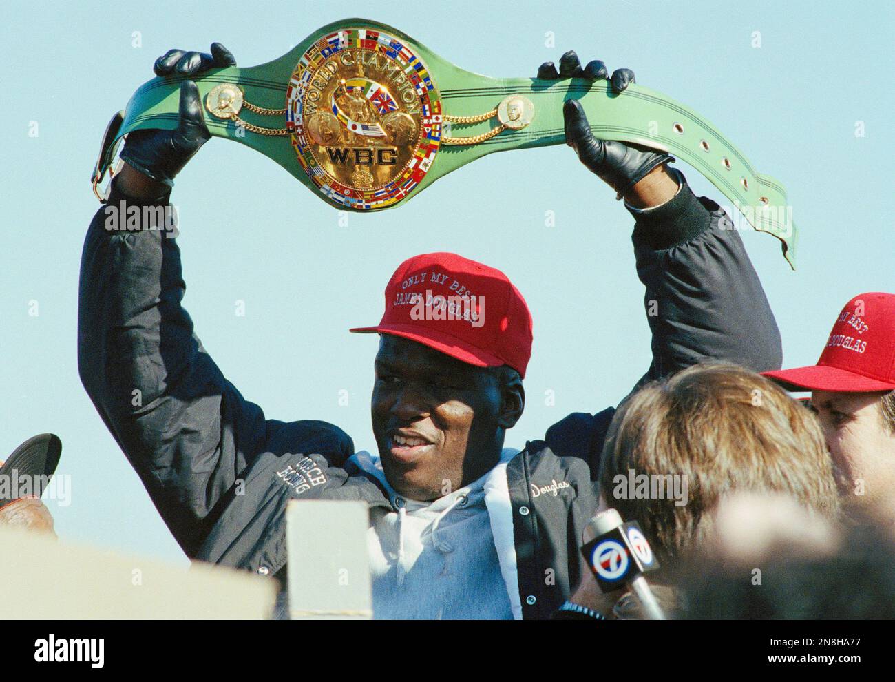 Newly crowned heavyweight champion James )(Buster) Douglas displays his ...