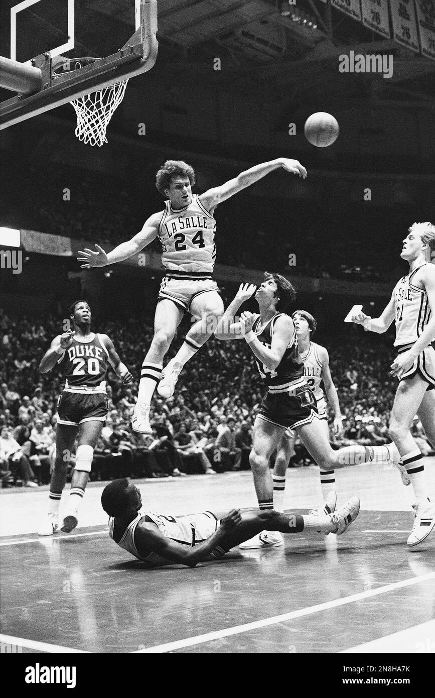 Tony Plakis (24) of La Salle leaps high as he blocks first half goal ...