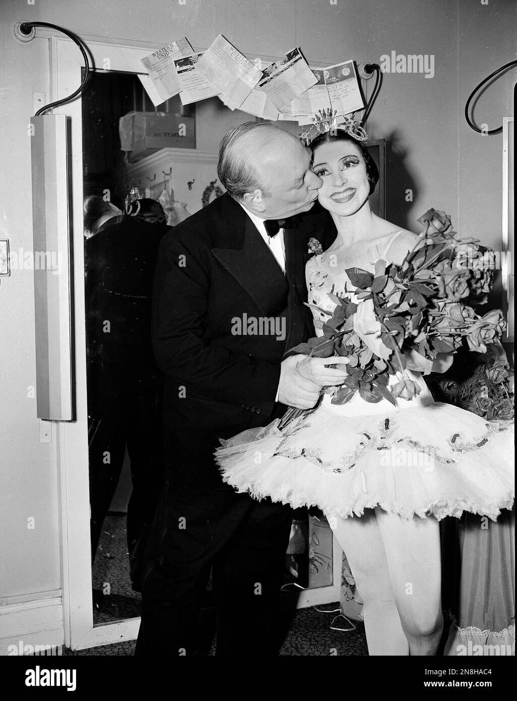 Prima ballerina Margot Fonteyn receives a congratulatory kiss from the ...