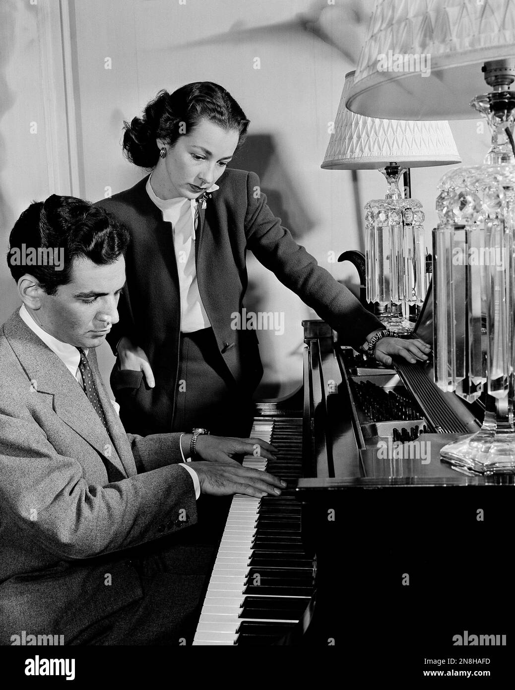 Composer and conductor Leonard Bernstein is seen with his fiancee ...