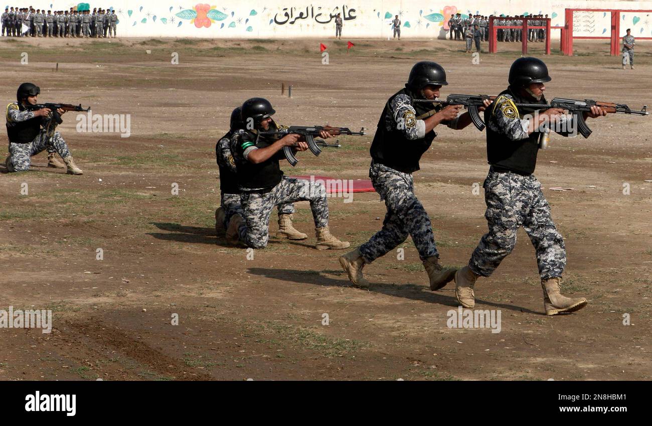 Iraqi federal police graduates demonstrate their skills during their ...