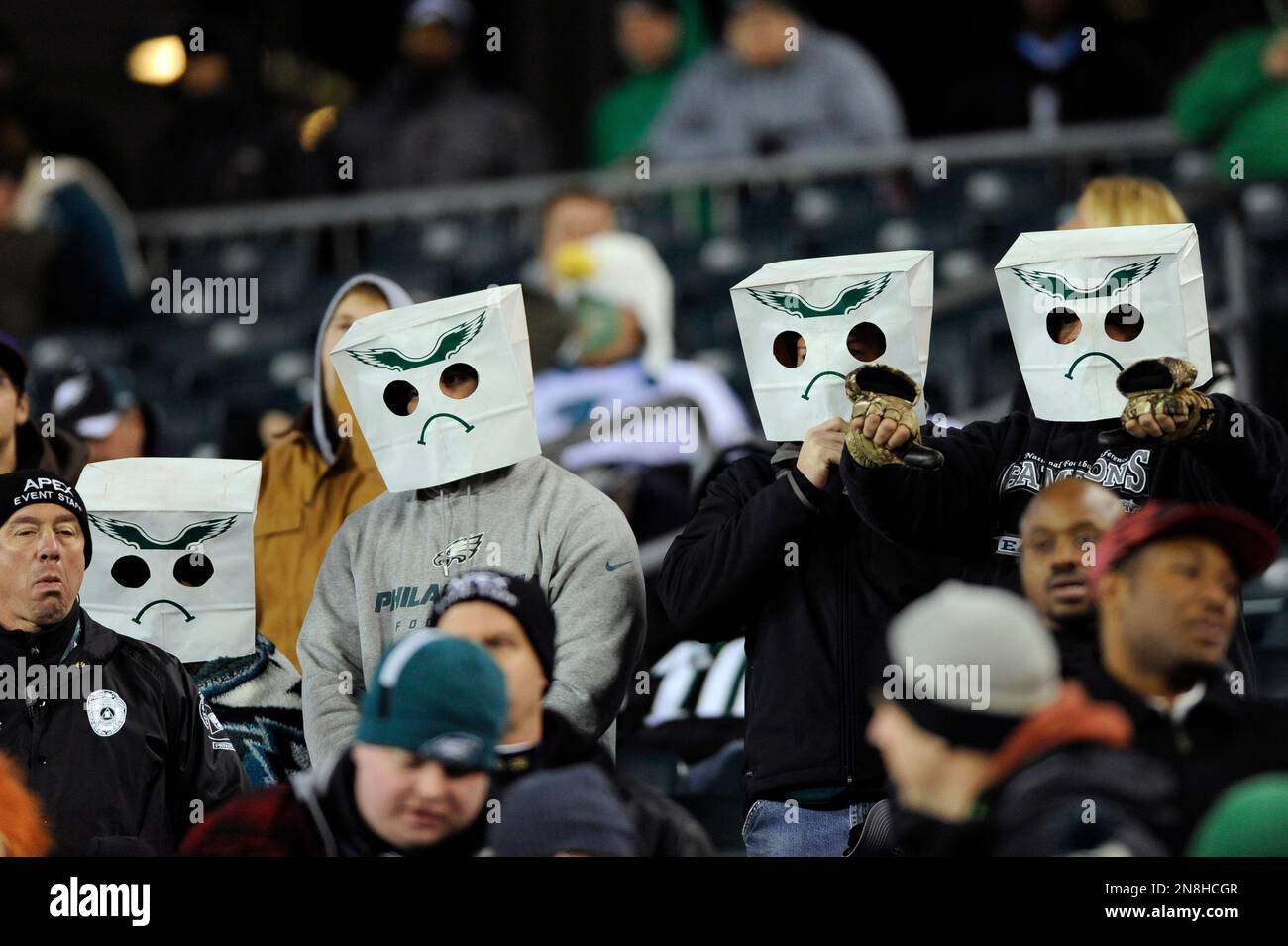 Philadelphia Eagles fans wear paper bags over their heads in the second ...