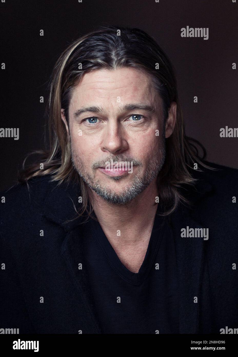 Brad Pitt poses for a portrait to promote his film, "Killing Them ...