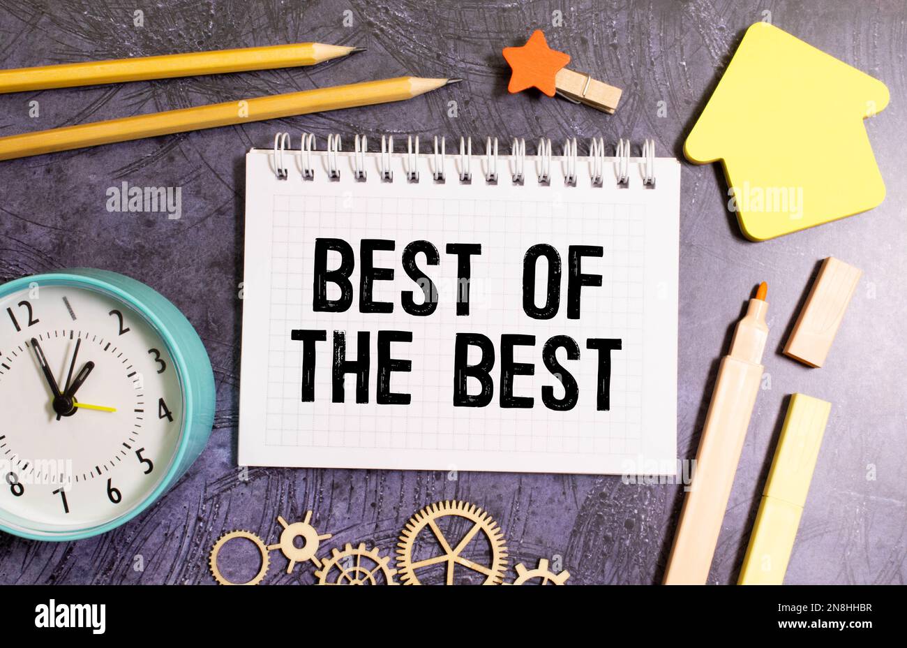 White flags with the words GOOD, BETTER, THE BEST kept in hands on a ...