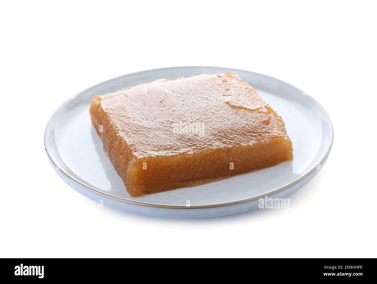 Delicious sweet quince paste isolated on white Stock Photo - Alamy