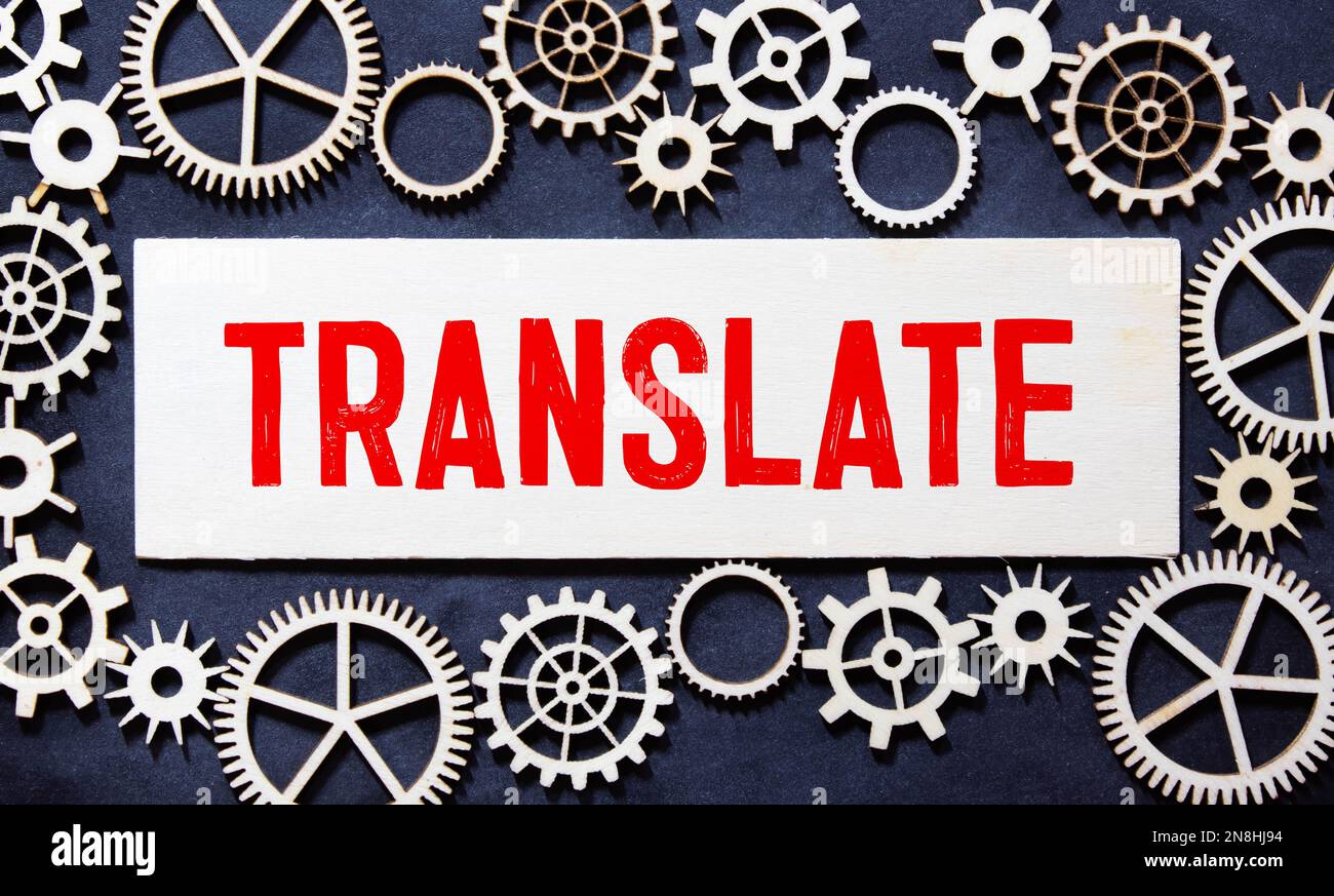 Translate message on a desk in a bright living room in the background ...