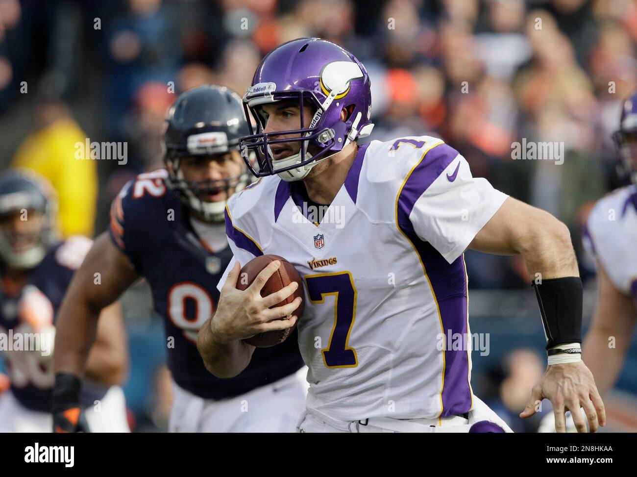 Minnesota Vikings quarterback Christian Ponder (7) rushes past Chicago ...