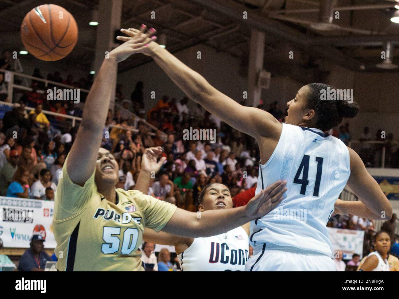 Connecticut center Kiah Stokes, right, and Purdue forward Taylor Manuel ...