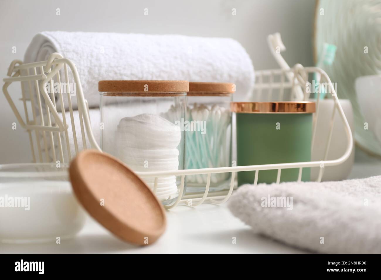 Personal hygiene products and toiletries on table in bathroom Stock ...