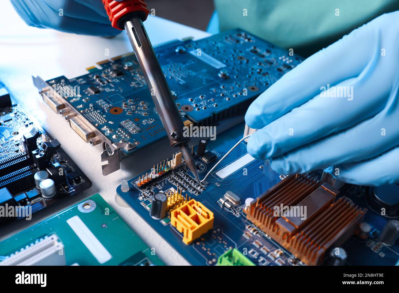 Technician electronic soldering repairing hi-res stock photography and ...