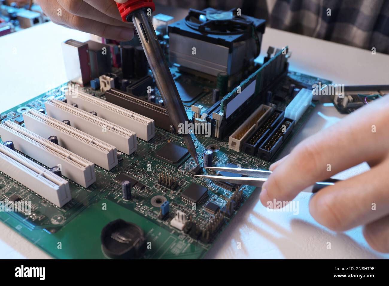 Technician electronic soldering repairing hi-res stock photography and ...