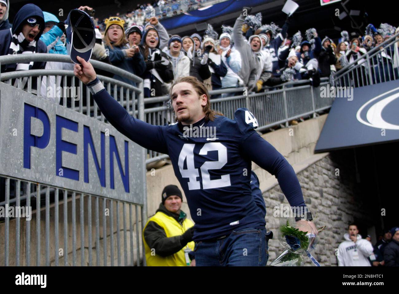 Injured Penn State linebacker Michael Mauti (42) is introduced during a ...