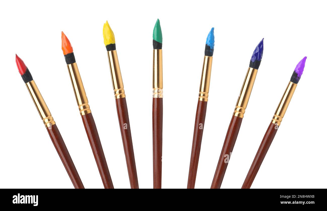 Collage of brushes with different bright paints on white background ...