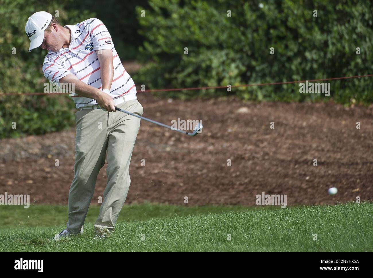 George Coetzee from South Africa plays a ball on the 3rd hole during ...