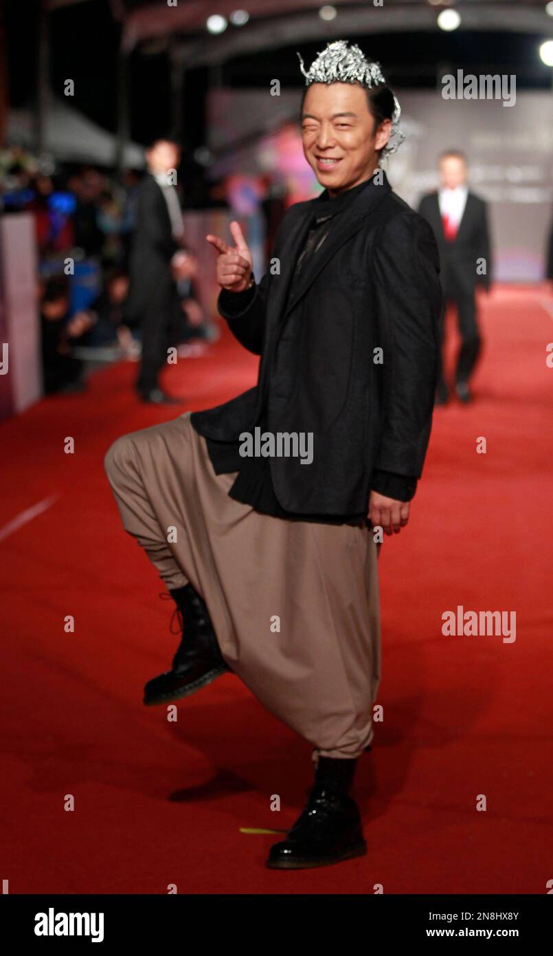Chinese Actor Huang Bo smiles as he arrives at the 49th Golden Horse ...