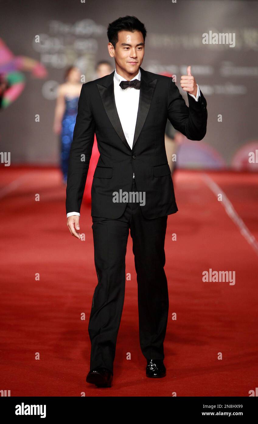 Taiwanese actor Eddie Peng arrives at the 49th Golden Horse Awards at ...