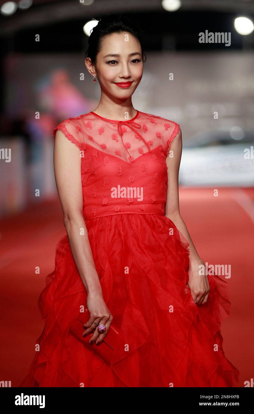 Chinese actress Bai Bai He smiles as she arrives at the 49th Golden ...