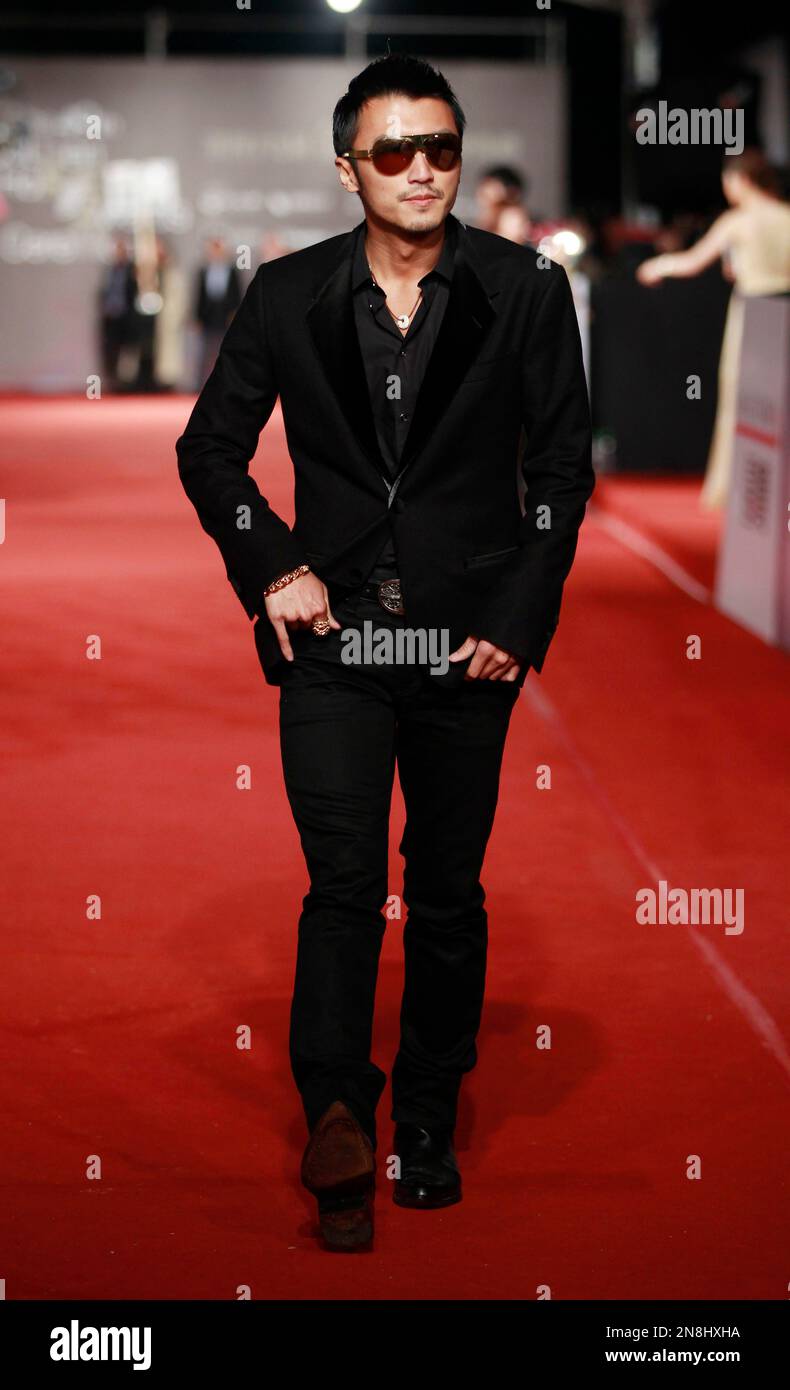 Hong Kong actor Nicholas Tse smiles as he arrives at the 49th Golden ...