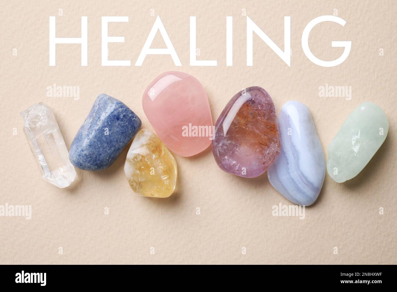 Beautiful gemstones on beige background, top view. Healing crystals ...