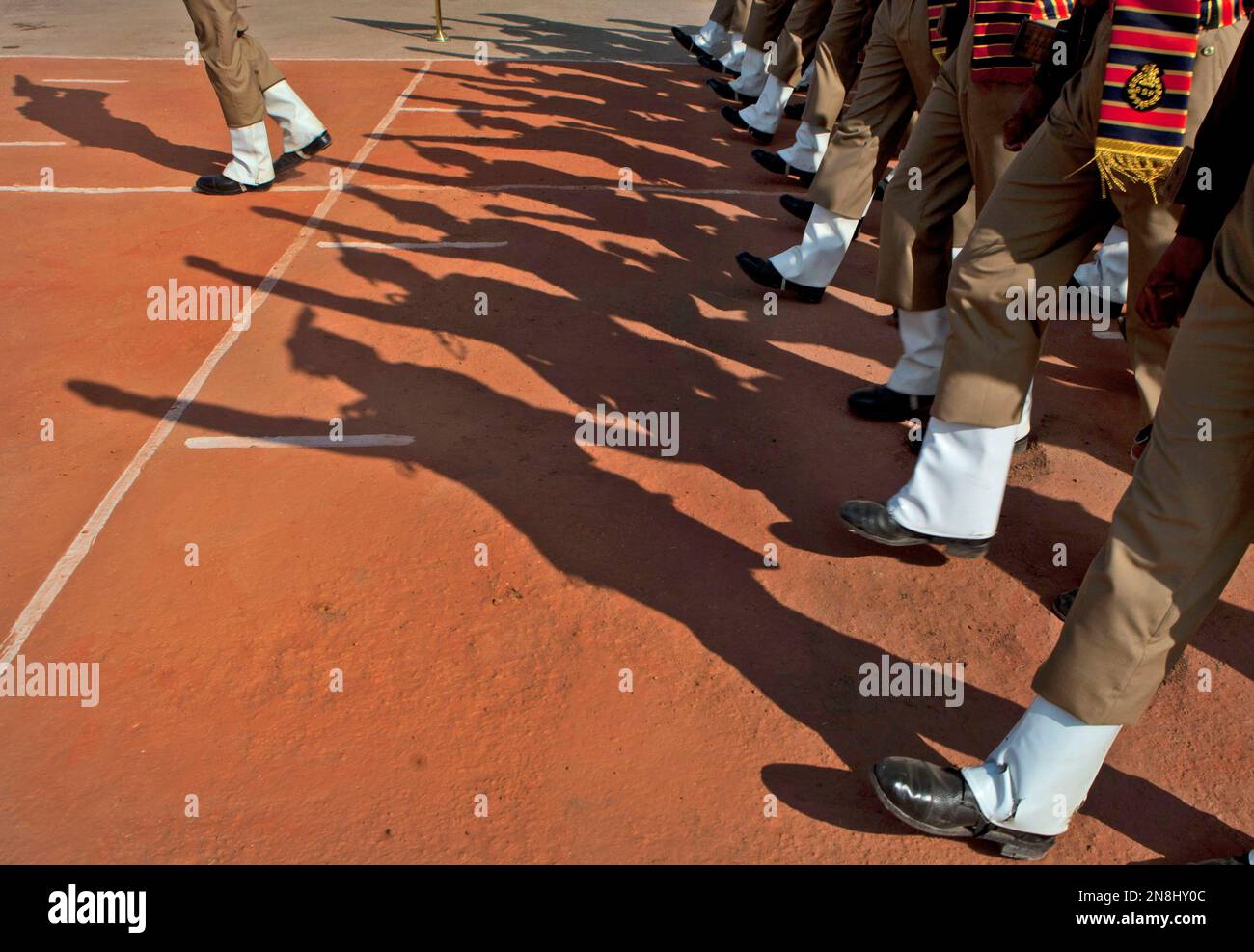 New recruits of the Indian Border Security Force (BSF) march during a ...