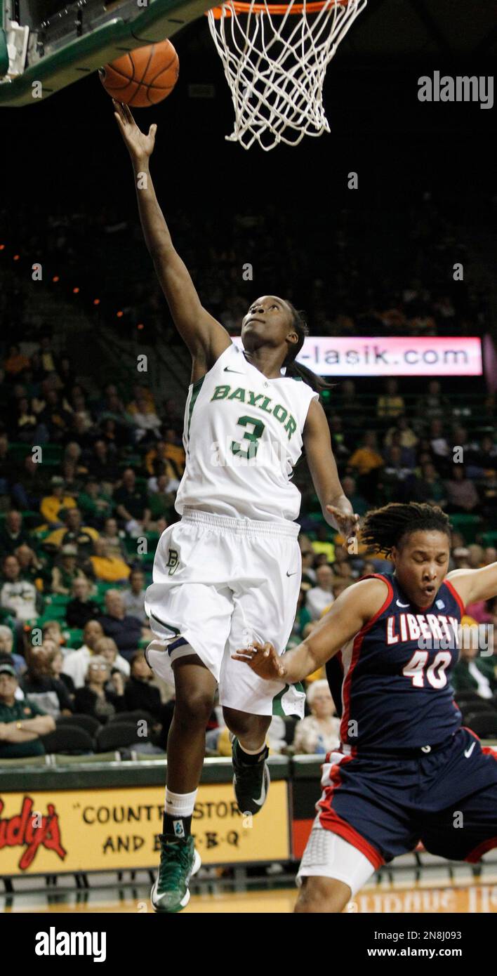 Baylor's Jordan Madden (3) shoots against Liberty's Devon Brown (40 ...