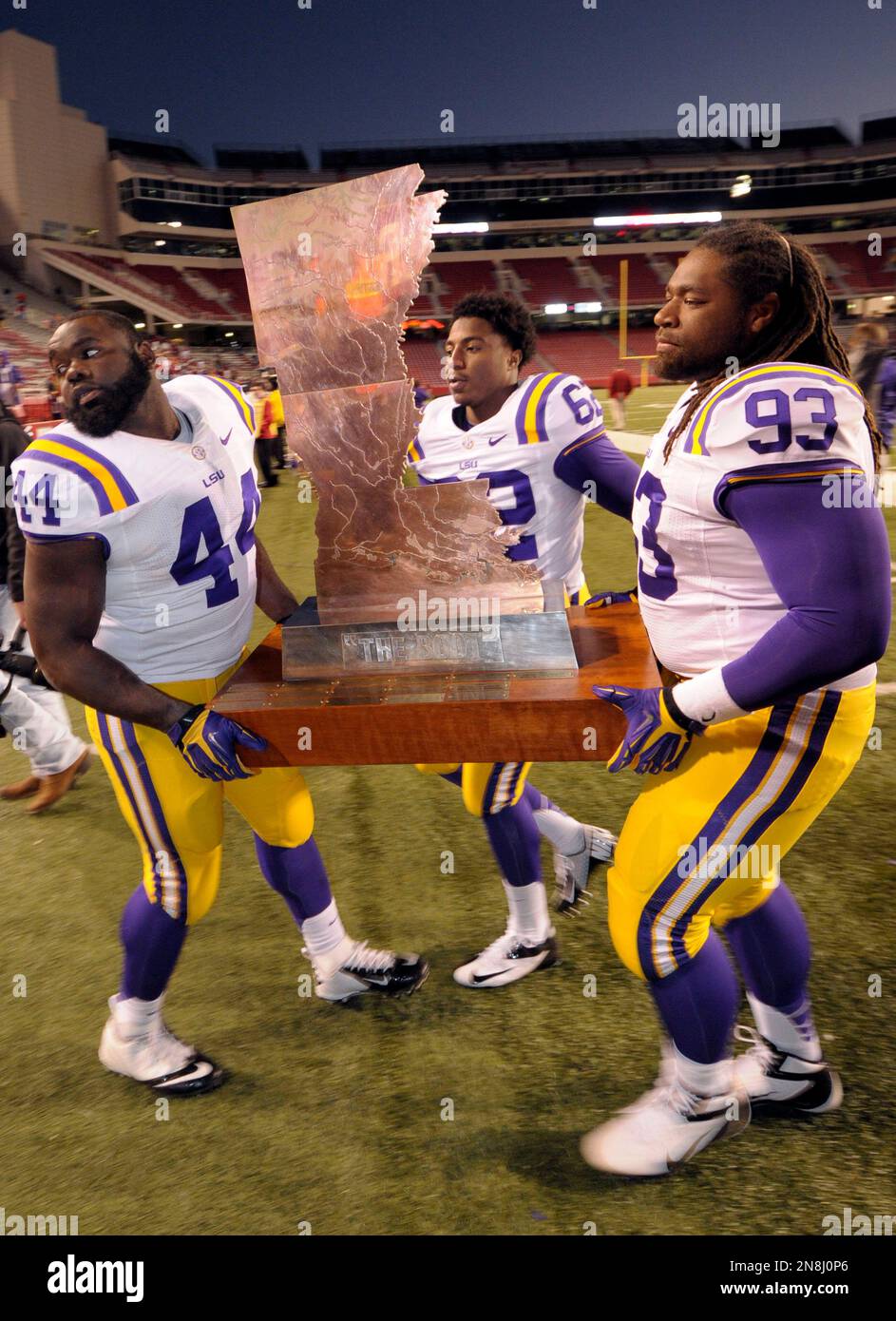 LSU fullback J.C. Copeland (44), linebacker Edwin Johnson (62) and ...
