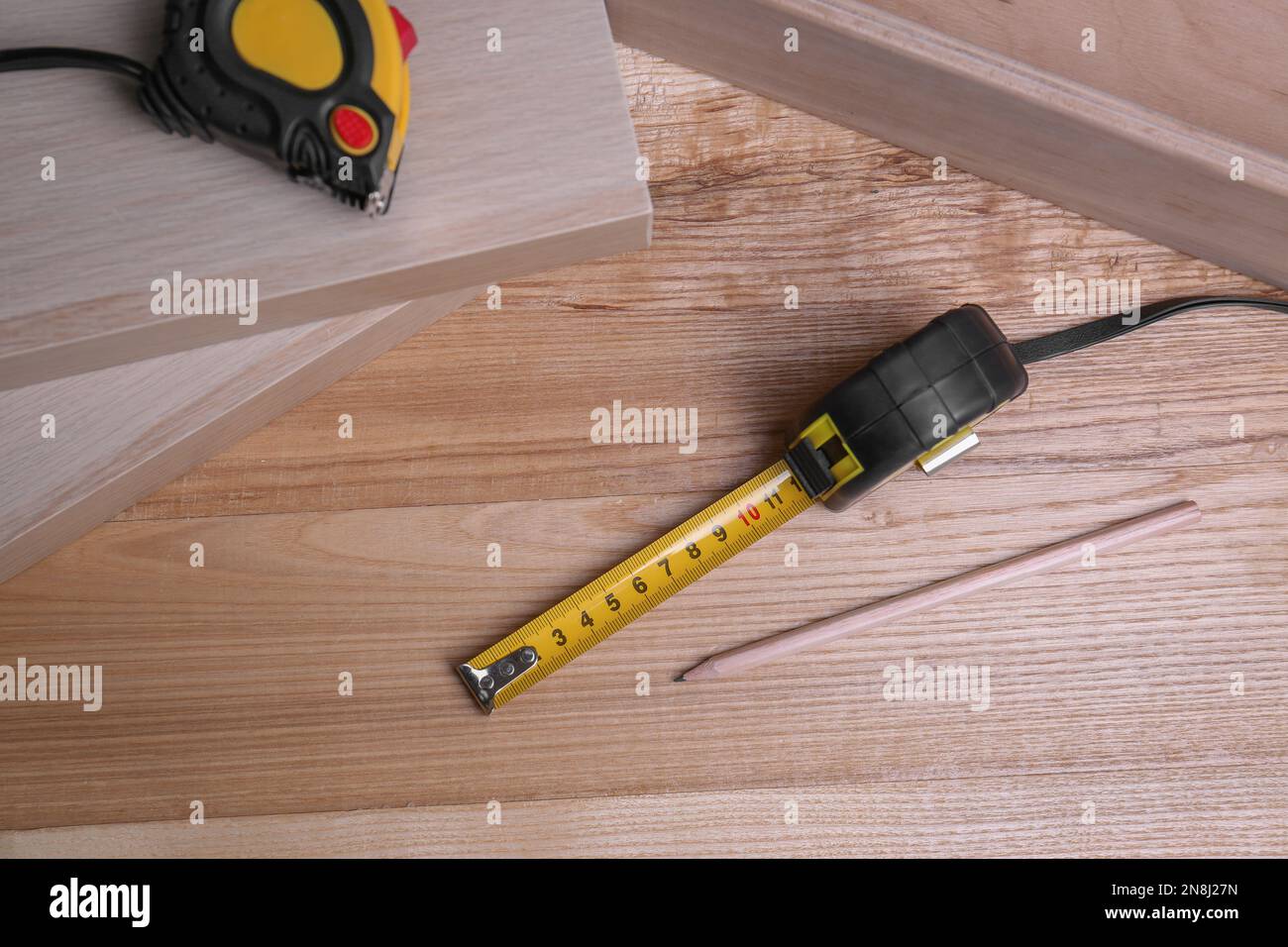 Long retractable tape measure hi-res stock photography and images - Alamy