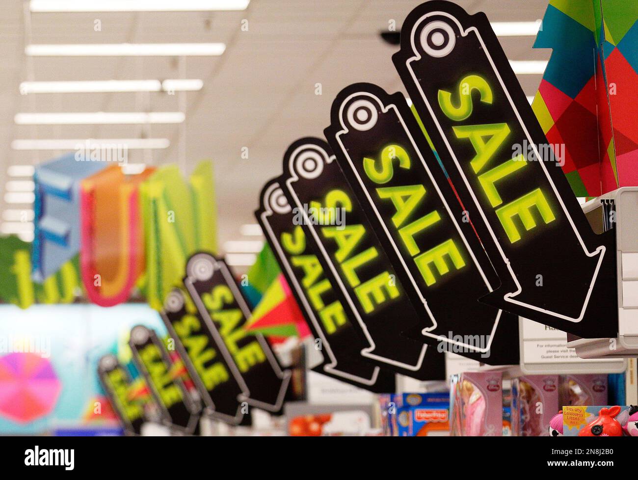 Sale signs are shown at a Target store in Colma, Calif., Friday, Nov ...