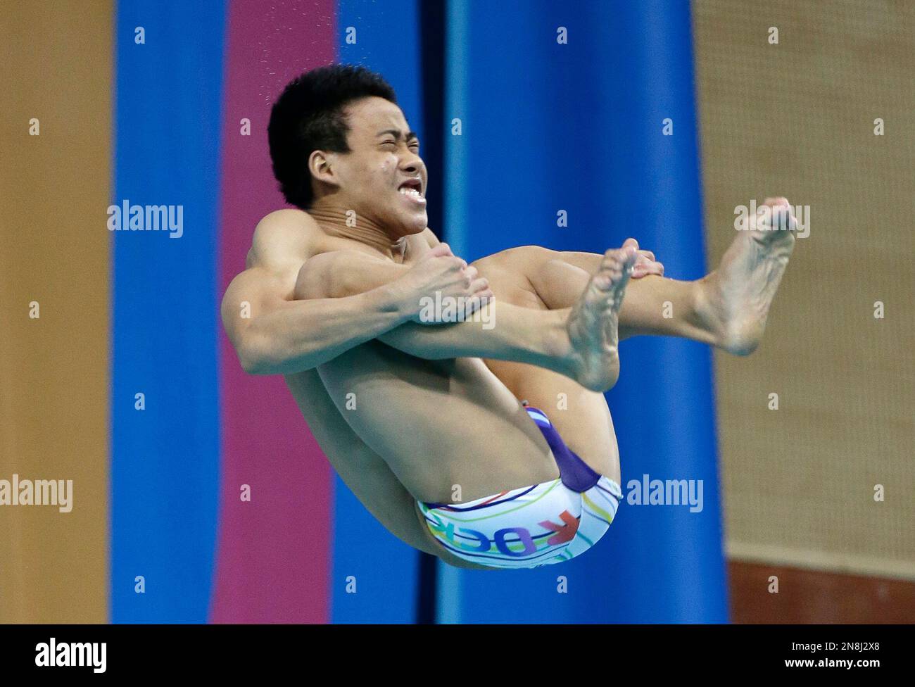 Liang Ooi of Malaysia dives to win the silver medal during the men's 3 ...