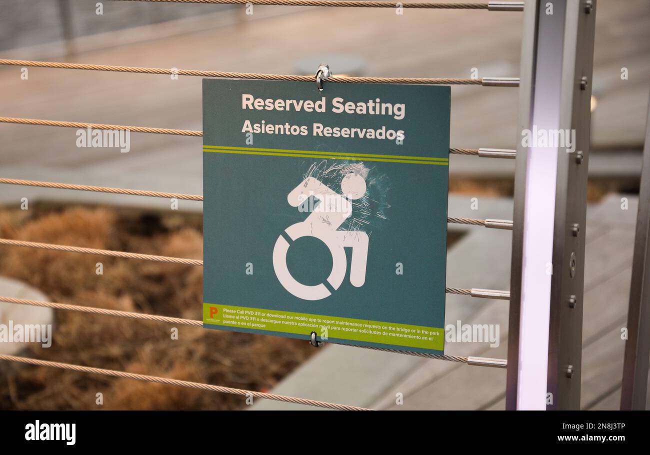 Handicap sign parking lot accessible symbol Stock Photo - Alamy