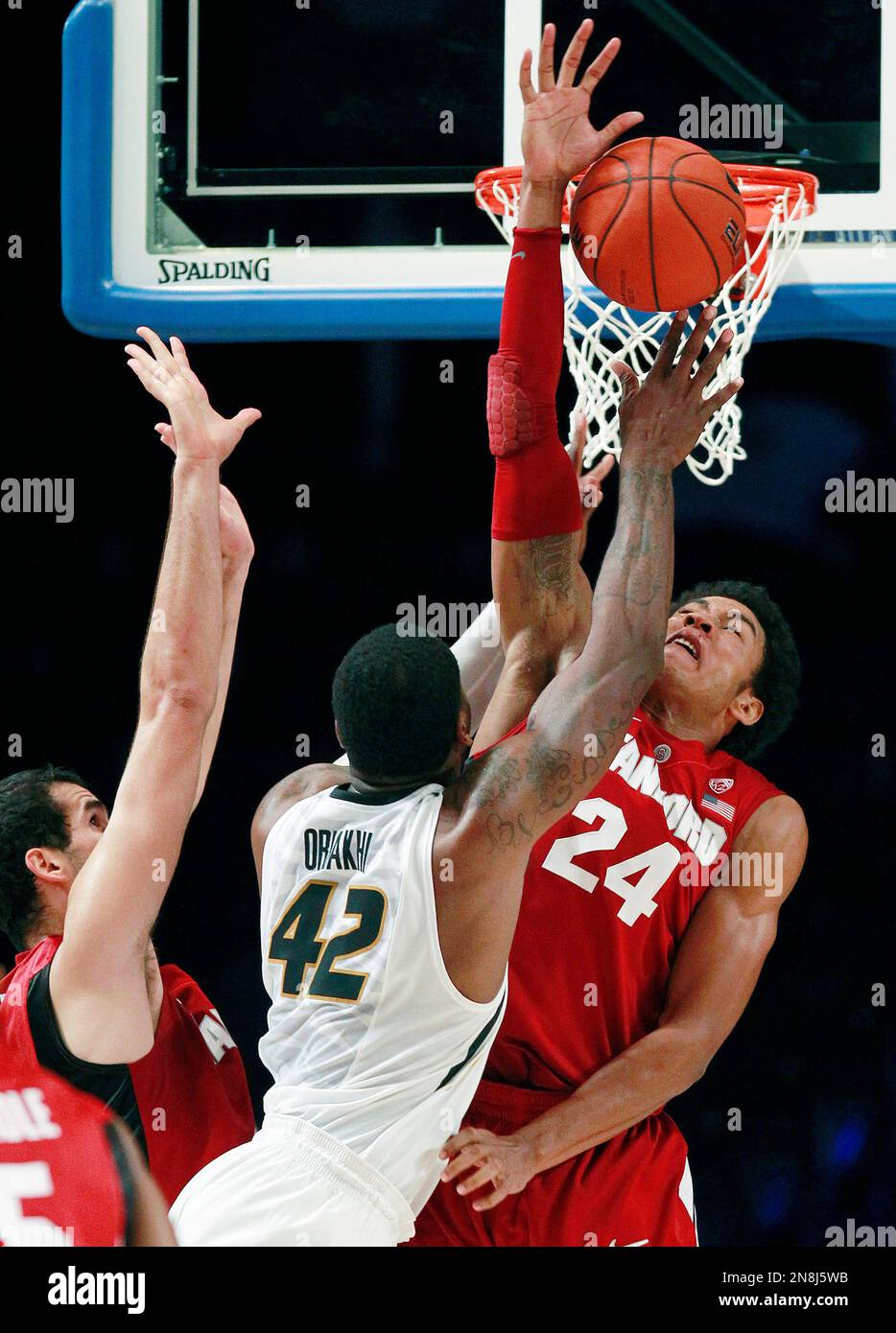 Missouri forward Alex Oriakhi (42) has his shot blocked by Stanford ...